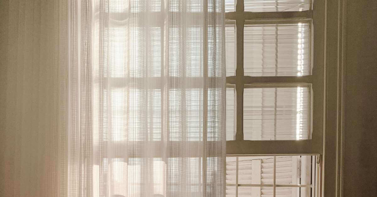 Pairing Plantation Shutters with Curtains