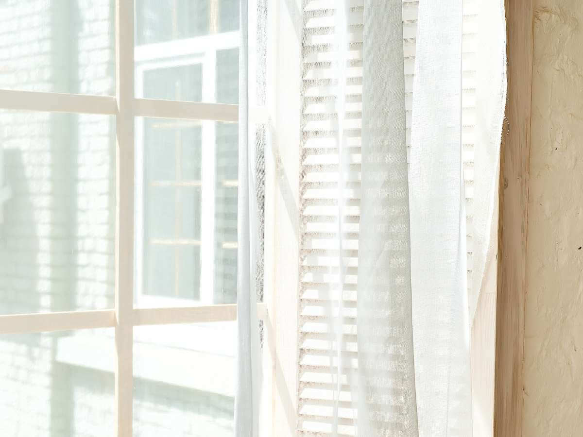 Pairing Plantation Shutters with Curtains